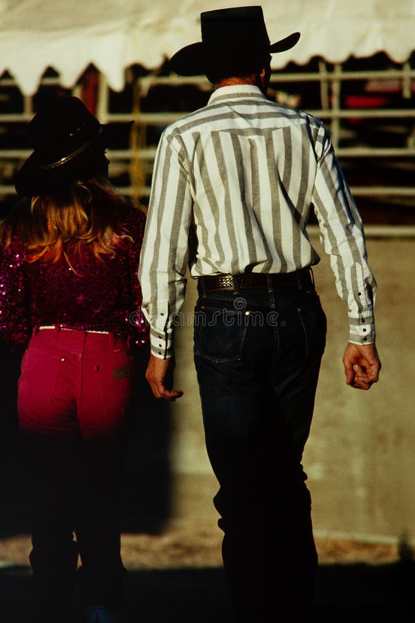 Rodeo Event Backstage. Western-style Outfits of Man and Young Woman ...