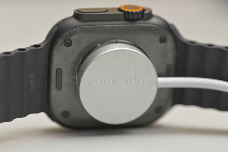 Back View of Smartwatch on Magnetic USB-C Charger Showing Textured ...