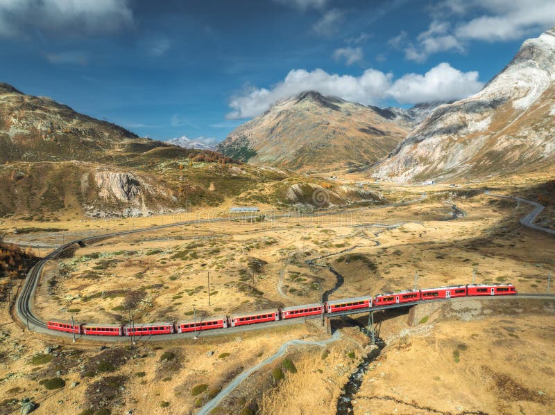 Aerial View of Modern Red Train, Alpine Mountains, Orange Meadows Stock ...
