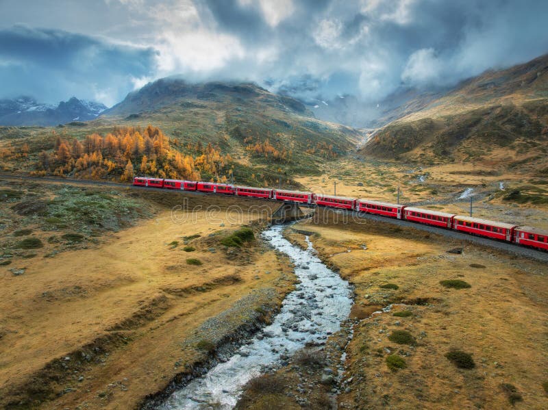 Aerial View of Red Train, River, Mountains, Orange Hills in Fall Stock ...