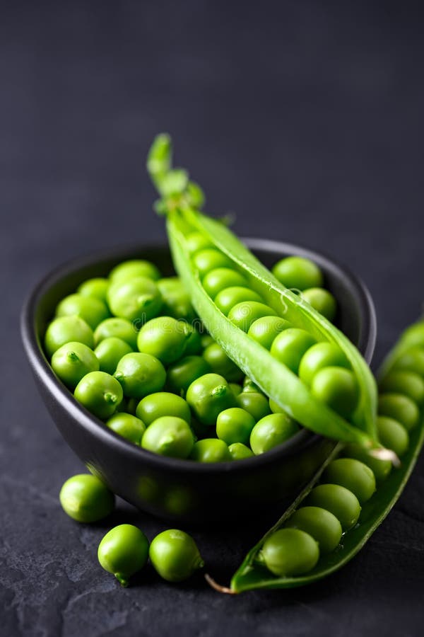Bowl of Fresh Sugar Snap Peas Placed on a Dark Surface Stock Image ...