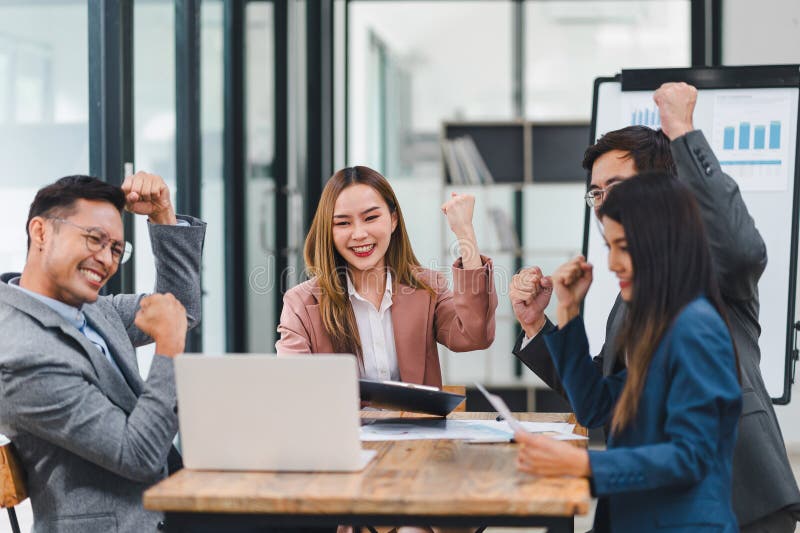 Business Team Celebrating Success in Office Meeting. Stock Photo ...