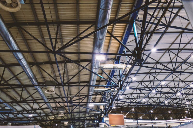 The Ceiling of an Industrial Hangar Illuminated by Fluorescent Lamps ...