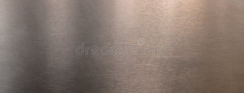 A Close-up of a Brushed Metal Surface with a Smooth and Reflective ...