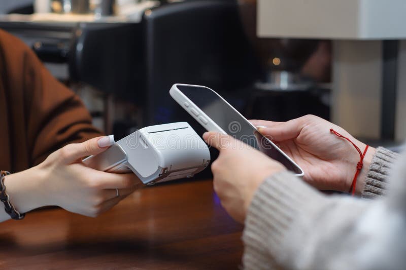 Customer Making Payment Using Credit Card in a Supermarket Stock Photo ...