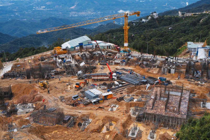 Construction Site with a Crane and an Excavator. Development of ...