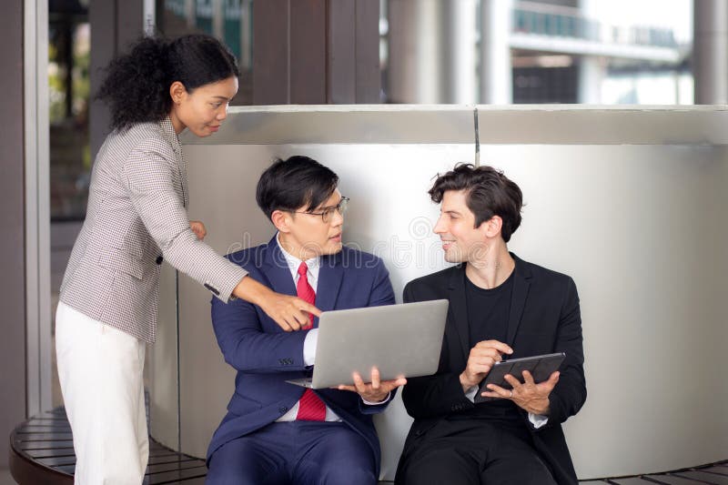 A Diverse Team of Professionals Collaborating on a Business Project ...