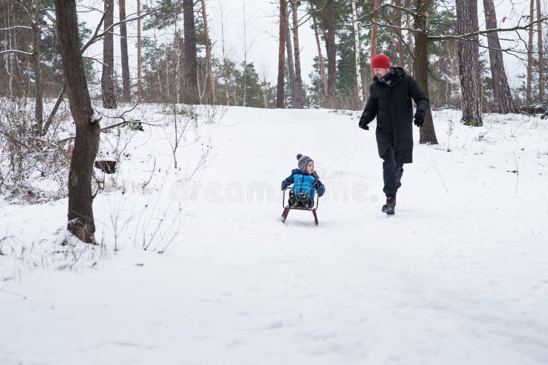 Father and Son 3 Years Old Sledding in Winter Stock Image - Image of ...