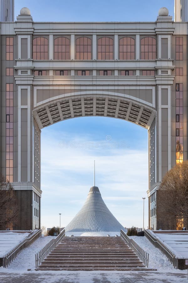Futuristic Conical Structure Framed by an Arch in Snowy Astana ...