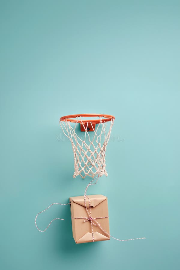Giftbox is Falling in Basketball Hitting Net. a Parcel Wrapped in Craft ...