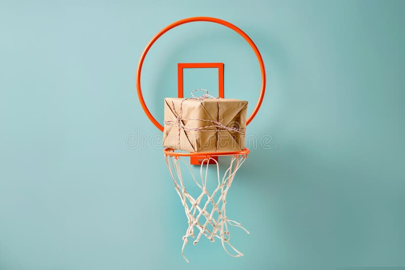 Giftbox is Falling in Basketball Hitting Net. a Parcel Wrapped in Craft ...