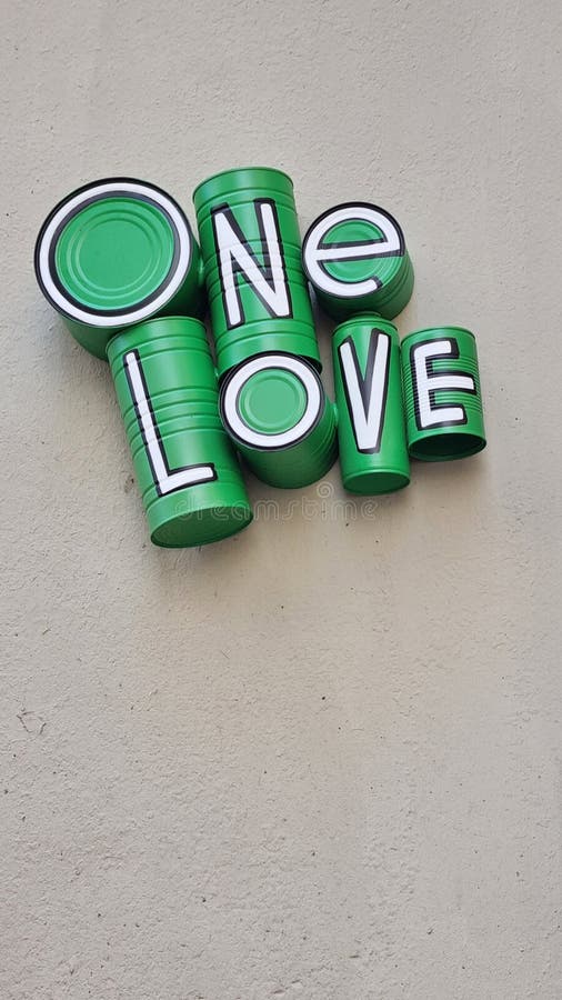 Green One Love Sign on Building Stock Image - Image of statement ...