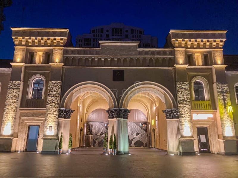 Image Shows a Grand, Historic Building at Night with Intricate Arches ...
