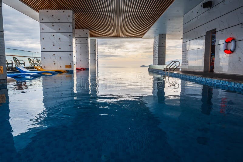 Interior of Luxury Skyscraper Hotel with Rooftop Pool Overlooking the ...