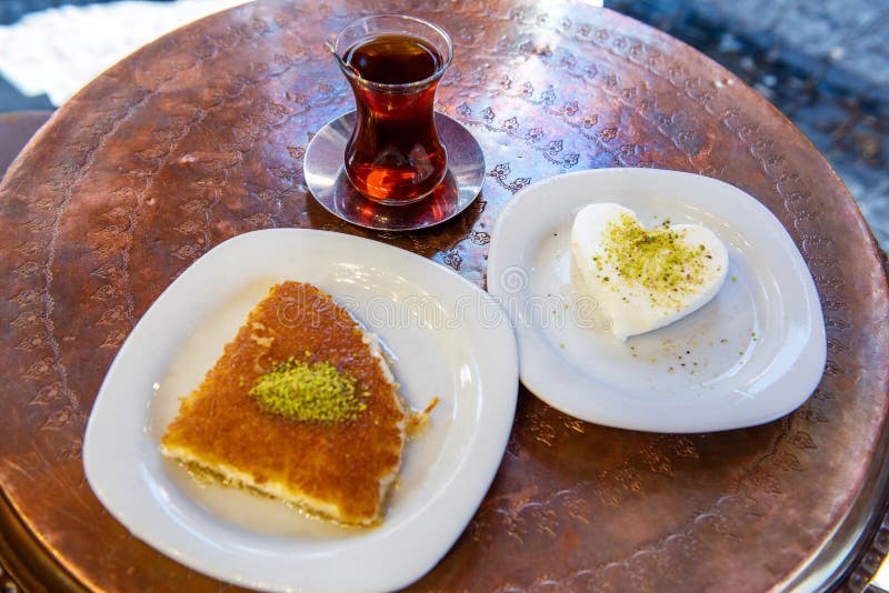 Traditional Turkish Dessert Kunefe with Turkish Tea and Ice Cream ...