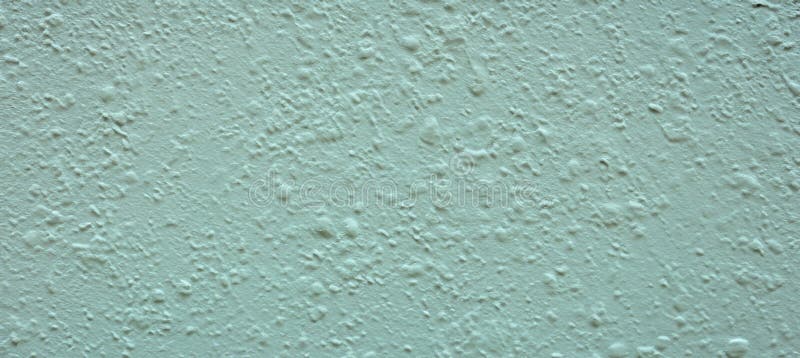Light Green Textured Wall with Bumps and Paint Drops Providing Copy ...