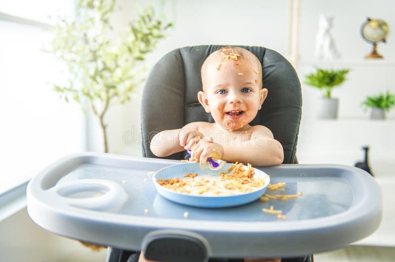 Little Baby Eating Her Dinner and Making a Mess Stock Image - Image of ...