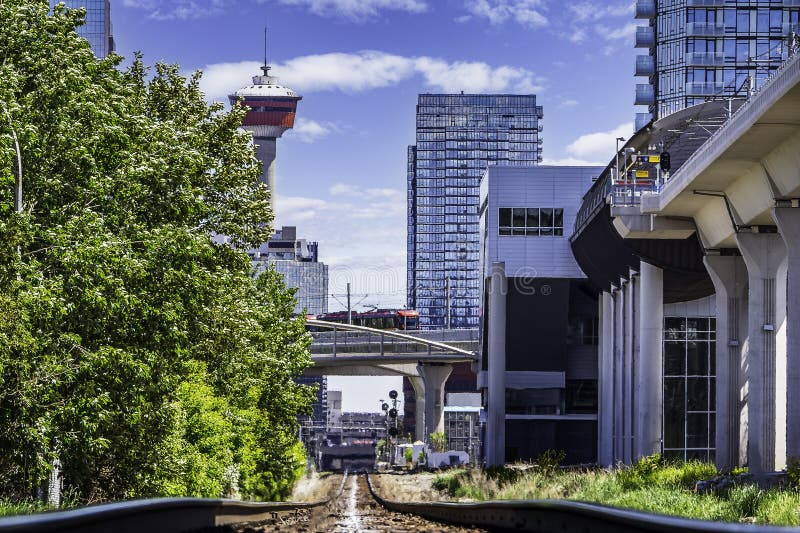 Low Rail View of Train Tracks Entering Downtown Along Elevated Transit ...