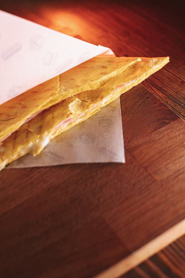 Thin Pancakes with Ham and Cheese in an Envelope are Placed on a ...