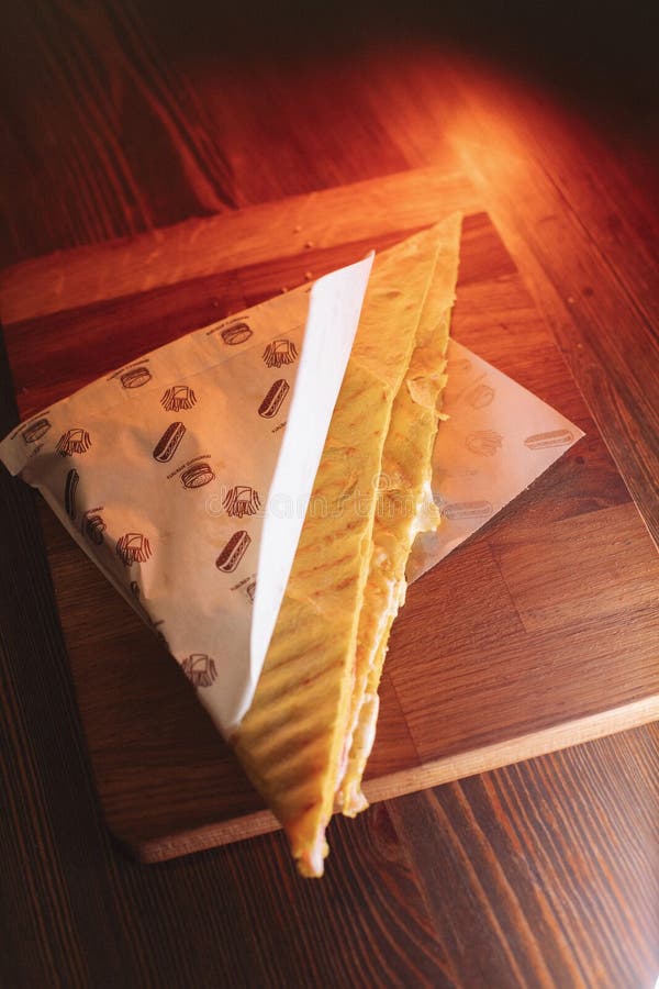 Thin Pancakes with Ham and Cheese in an Envelope are Placed on a ...