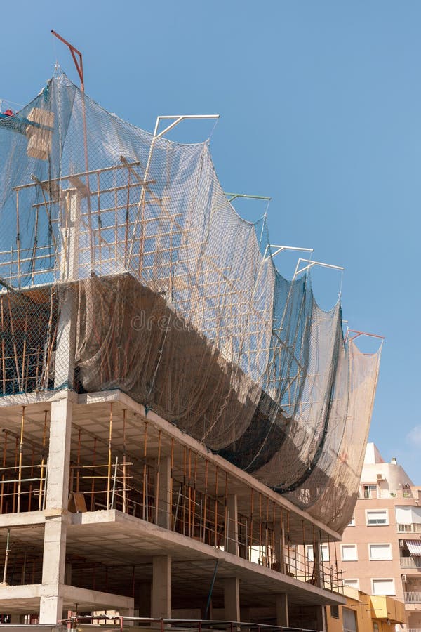 New Building Construction Process. Safety Nets and Structural Beams ...