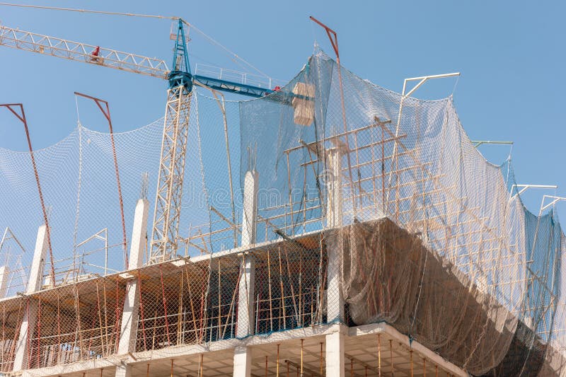 New Building Construction Process. Safety Nets and Structural Beams ...