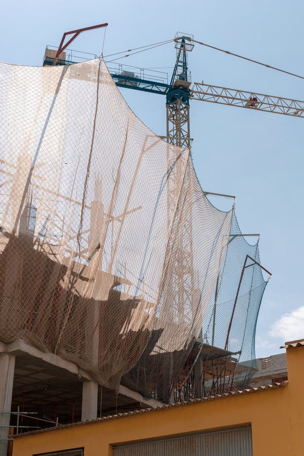 New Building Construction Process. Safety Nets and Structural Beams ...