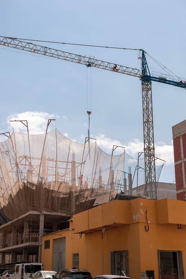 New Building Construction Process. Safety Nets and Structural Beams ...