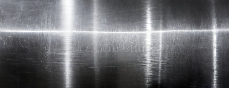 Polished Stainless Steel Surface Reflecting Bright Light, Creating a ...