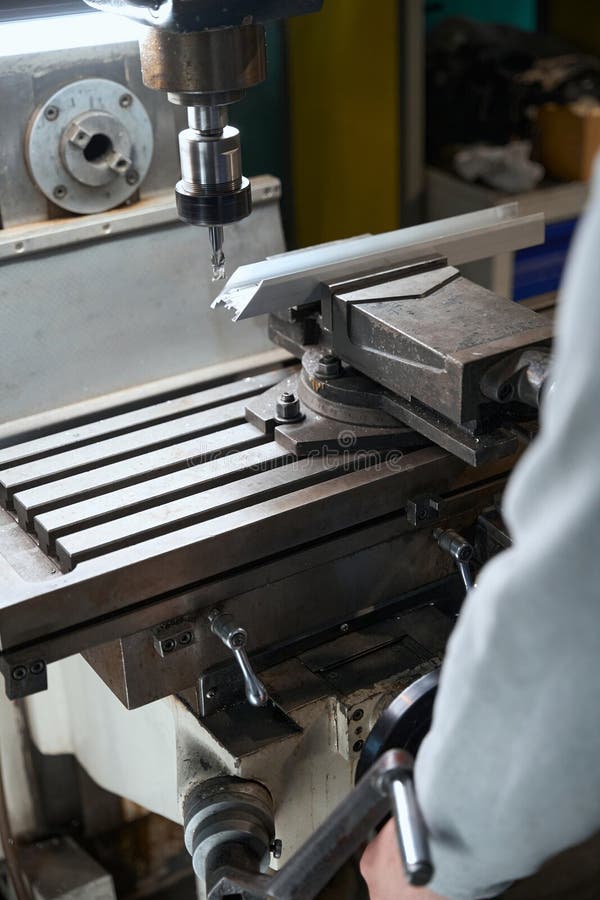 Process of Drilling a Hole into Aluminum Profile on Machine Stock Photo ...