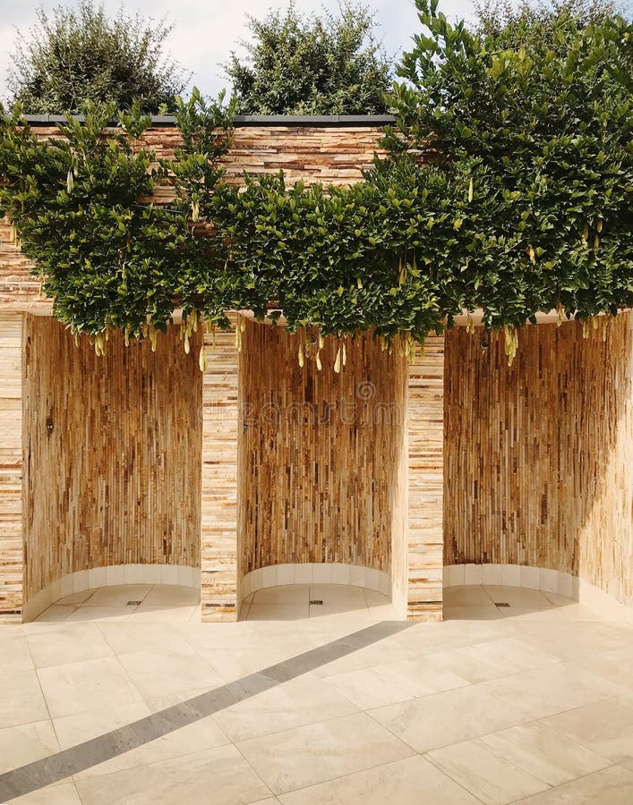 Three Public Showers at the Beach. Stock Photo - Image of stone, shower ...
