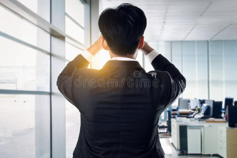 Generated Image Scene of a Man in a Suit Holding His Head Down at Work ...