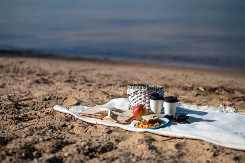 Summer Picnic by the Lake with Hot Drinks, Snacks, an Open Book Stock ...