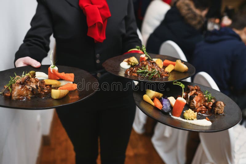 Waiter Serving Food Meat with Vegetables in Restaurant Stock Photo ...