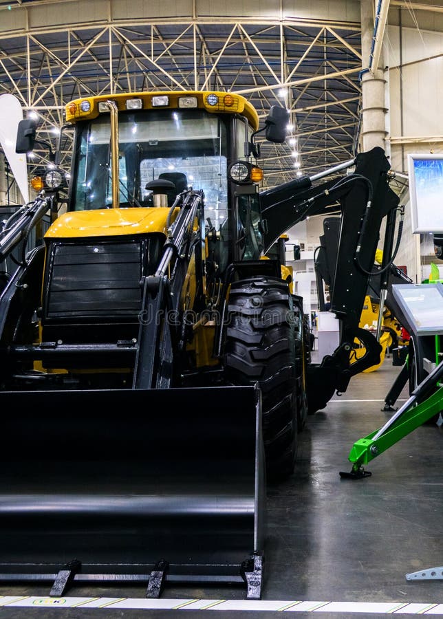 A Yellow Front-end Loader, a Type of Heavy Construction Equipment ...