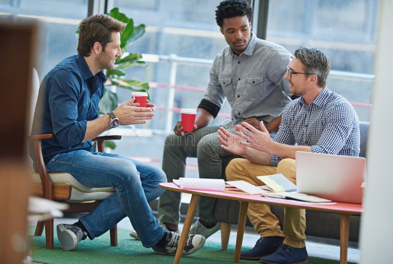 Generating Dynamic Ideas. a Group of Office Workers Talking Together in ... Generating Dynamic Ideas. a Group of Office Workers Talking Together in ...