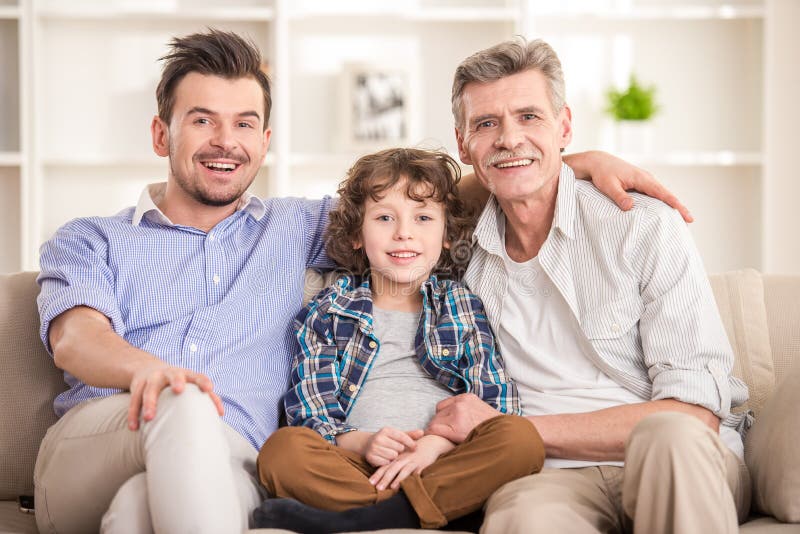Generation Portrait. Grandfather, Father and Son Sitting on Sofa Stock ...