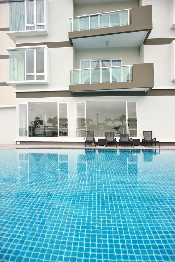Generic Condominium Outdoor with Swimming Pool Stock Image - Image of ...