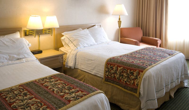 A generic hotel room stock image. Image of bedding, beds - 4096579