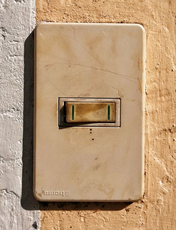Generic Old Light Switch Being Hit by Sunlight and Deteriorated Yellow ...