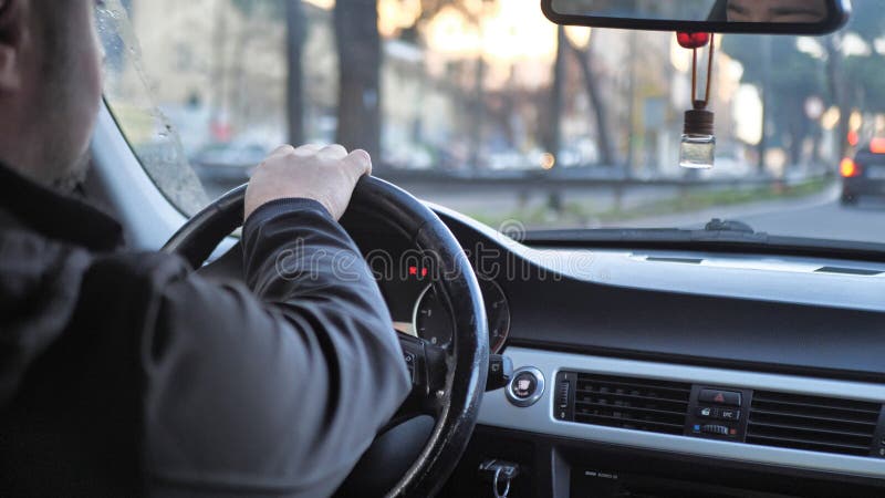 Generic Photo of Man Driving a Car through Slight Turn. Stock Photo ...