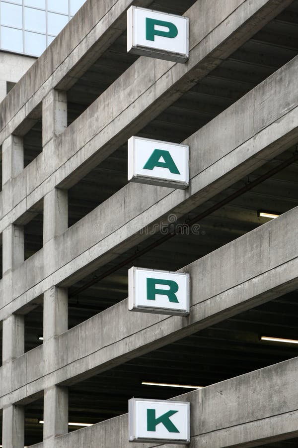 Generic Sign on a Parking Deck Stock Image - Image of cement, stacked ...