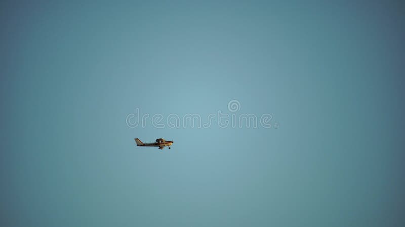 Generic Small Private Single Engine Airplane Flying in a Sunny Blue Sky ...