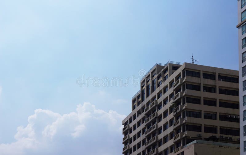 Generic Tower or Apartment on Blue Sky Background Stock Photo - Image ...