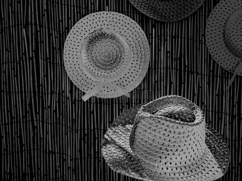 Generic Wicker Hats on Bamboo Stock Photo - Image of fashion, blur ...