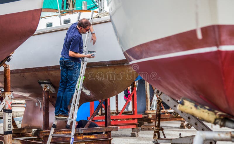 Geneva Waterfront View -Man Fixing Boat Editorial Stock Photo - Image ...