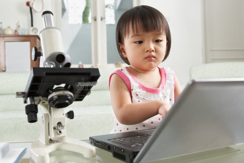 Genius Little Girl with Laptop and Microscope Stock Image - Image of ...