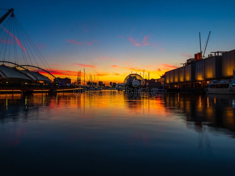 Genoa port with sunset stock image. Image of night, destination - 257136613
