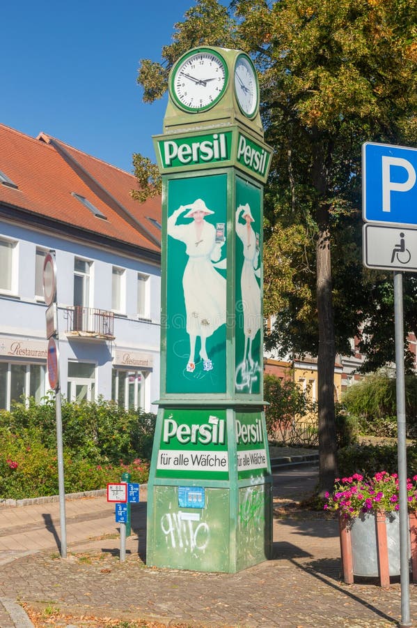 Clock with Persil Advertisement Editorial Stock Image - Image of ...
