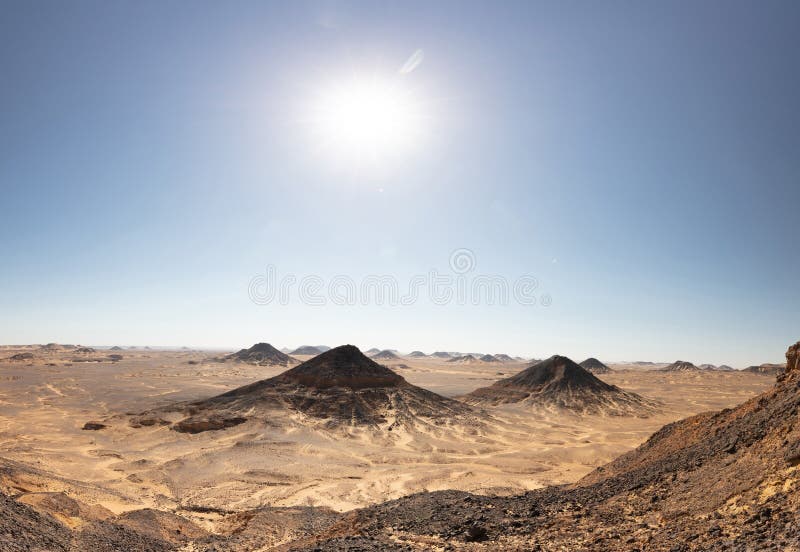 Gentle Blue Sky with the Sun Over the Black Desert. Stock Image - Image ...